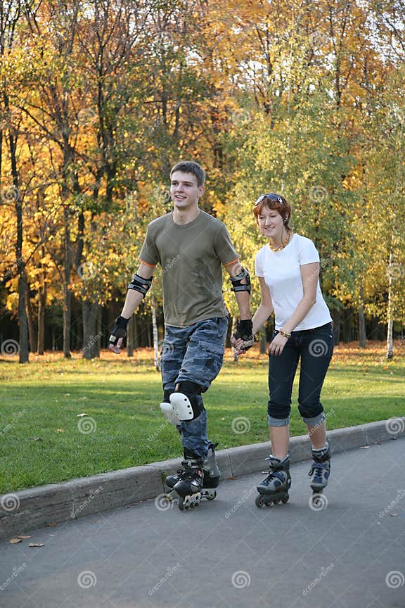 Roller couple stock photo. Image of rollerblades, people - 3310542