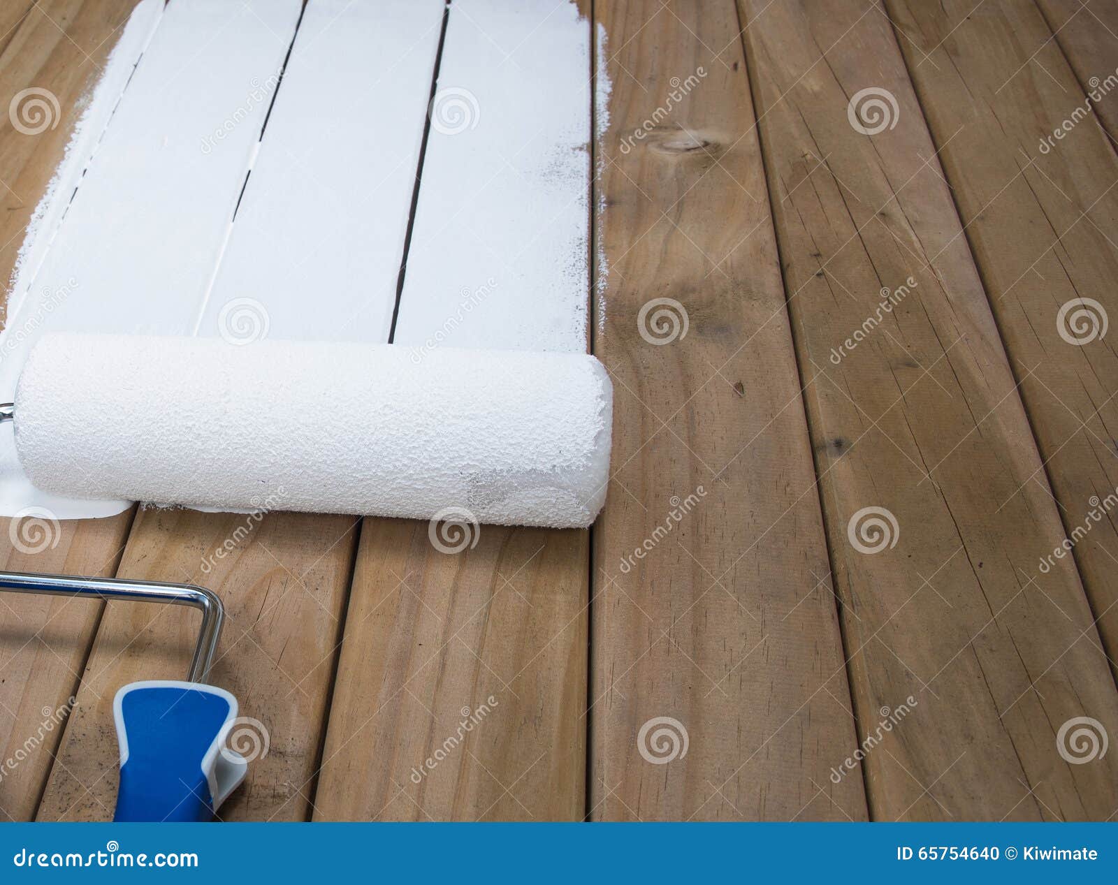 Roller paint on timber stock photo. Image of closeup - 65754640