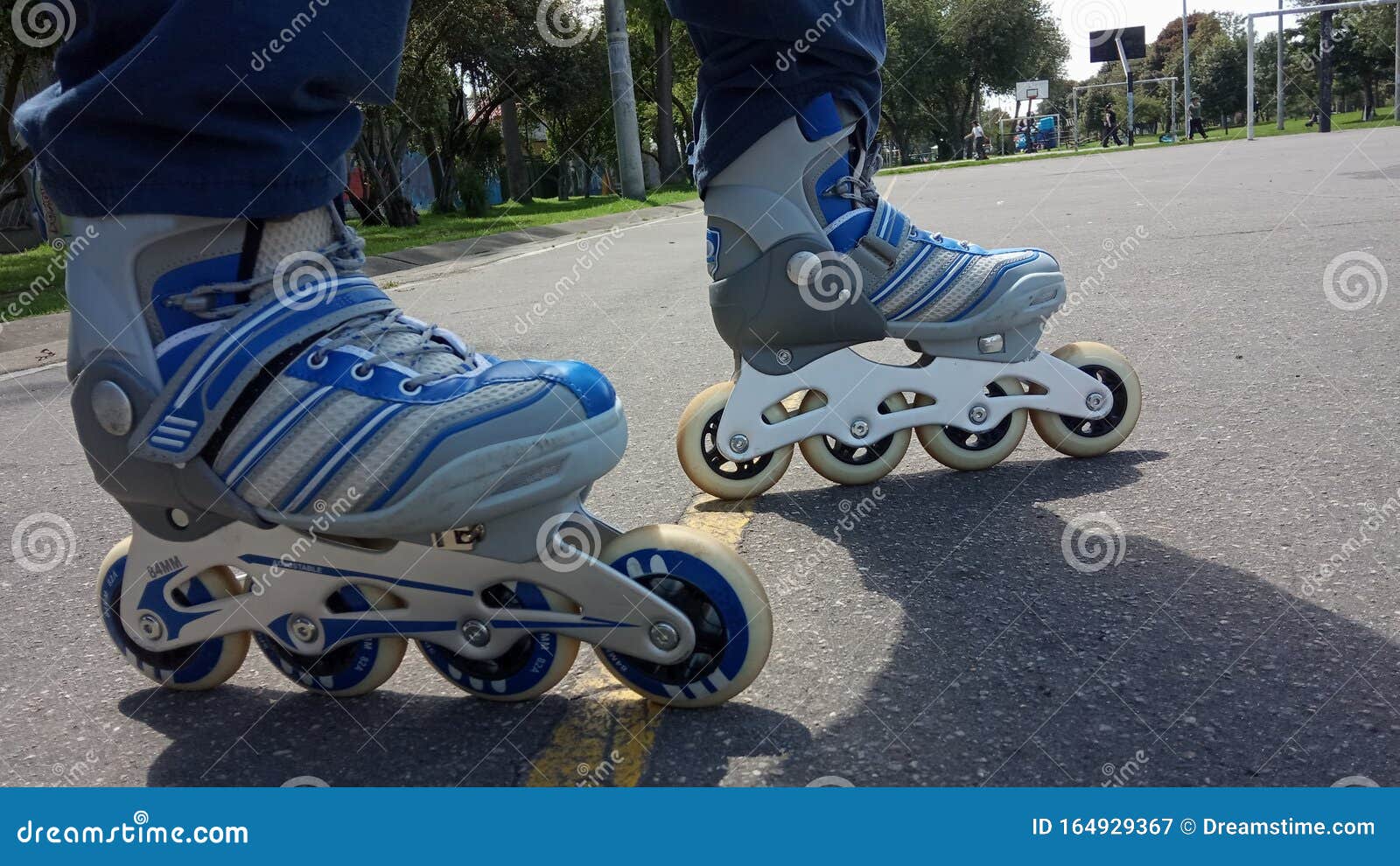 Roller skates at the park stock image. Image of sport - 164929367