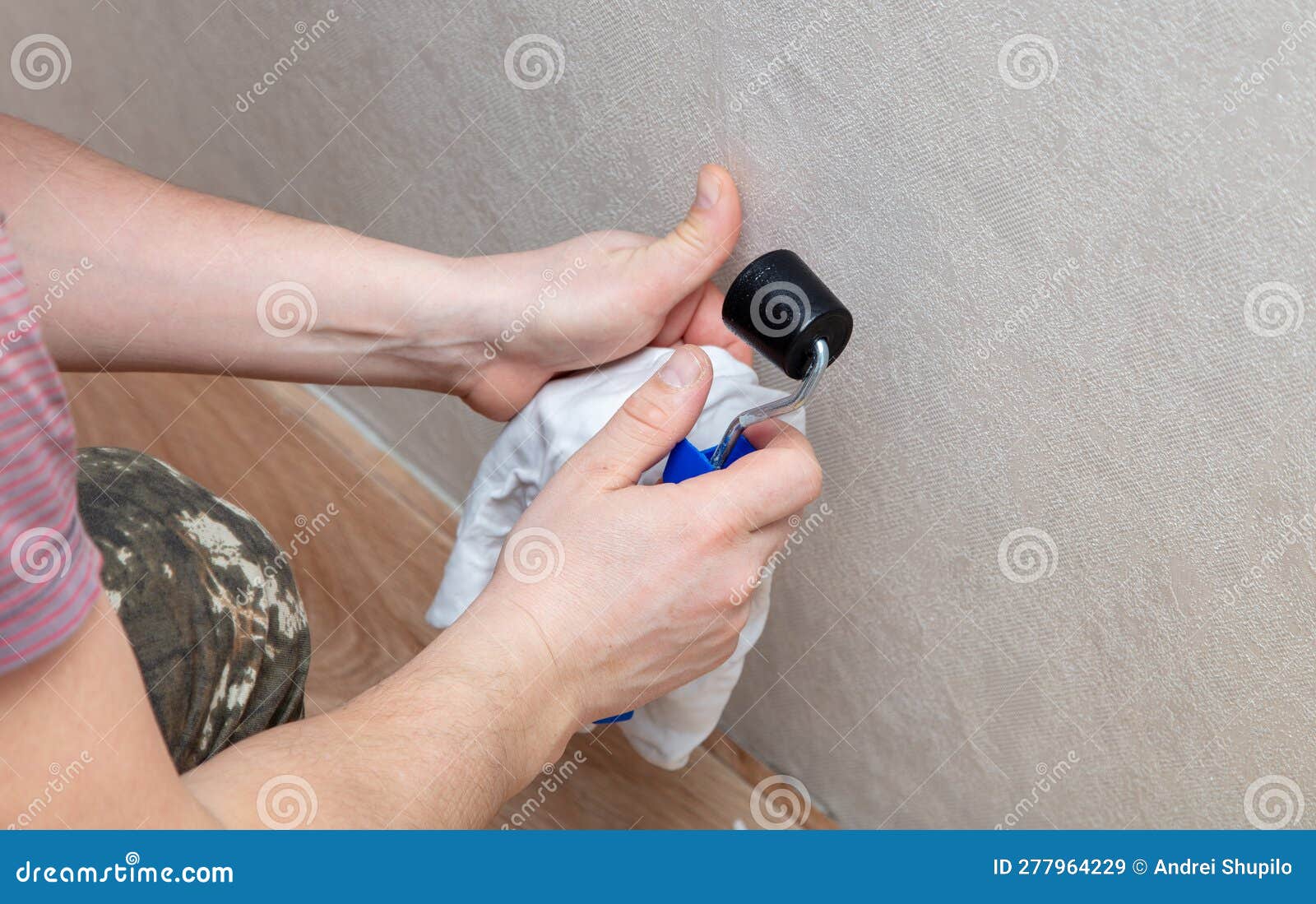 Roller for Smoothing Wallpaper on the Wall Stock Image - Image of ...