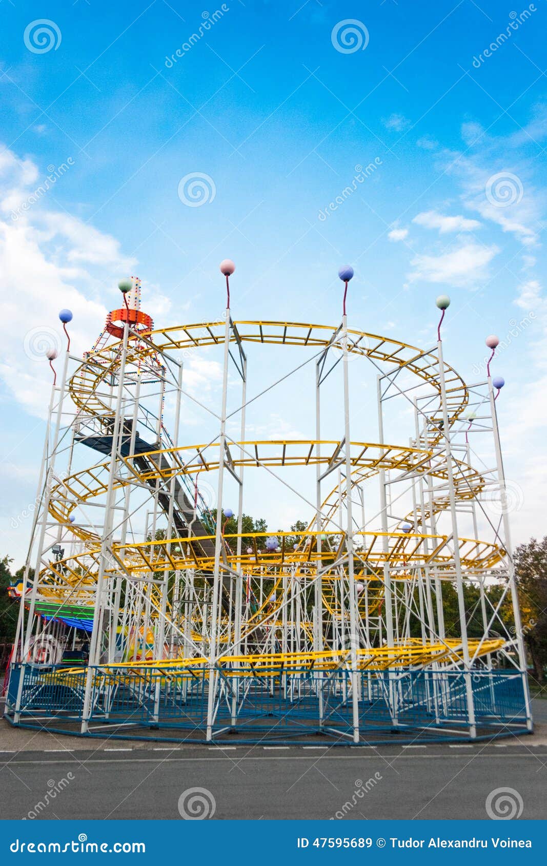 Rollercoaster in the Evening Against Blue Sky. Stock Image - Image of ...