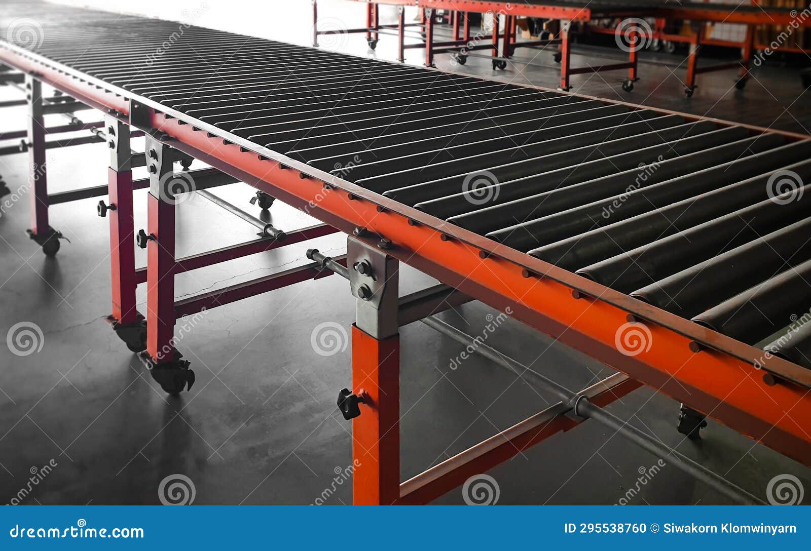 Rollers Conveyer in Distribution Warehouse. Shipping Supplies Cargo ...