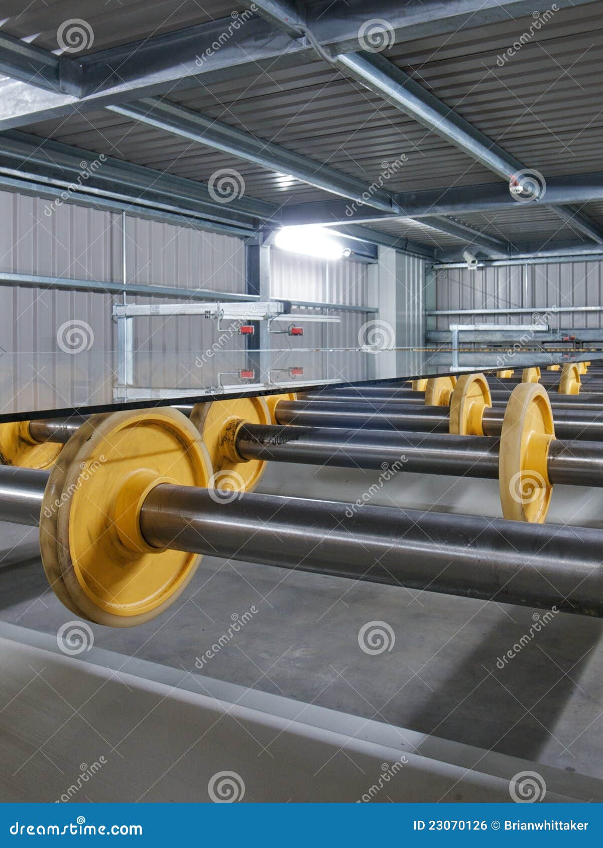 Rollers in a glass factory stock photo. Image of manufacturing - 23070126