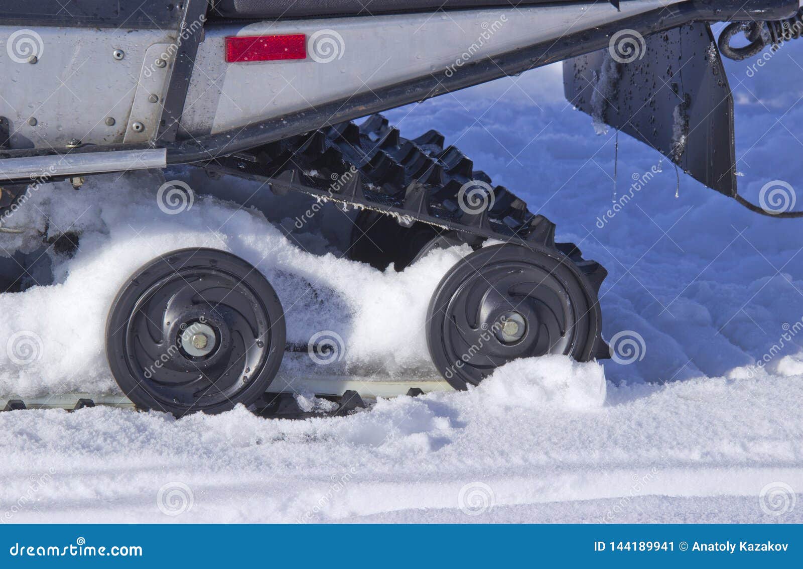 Rollers of the snowmobile stock image. Image of drift - 144189941
