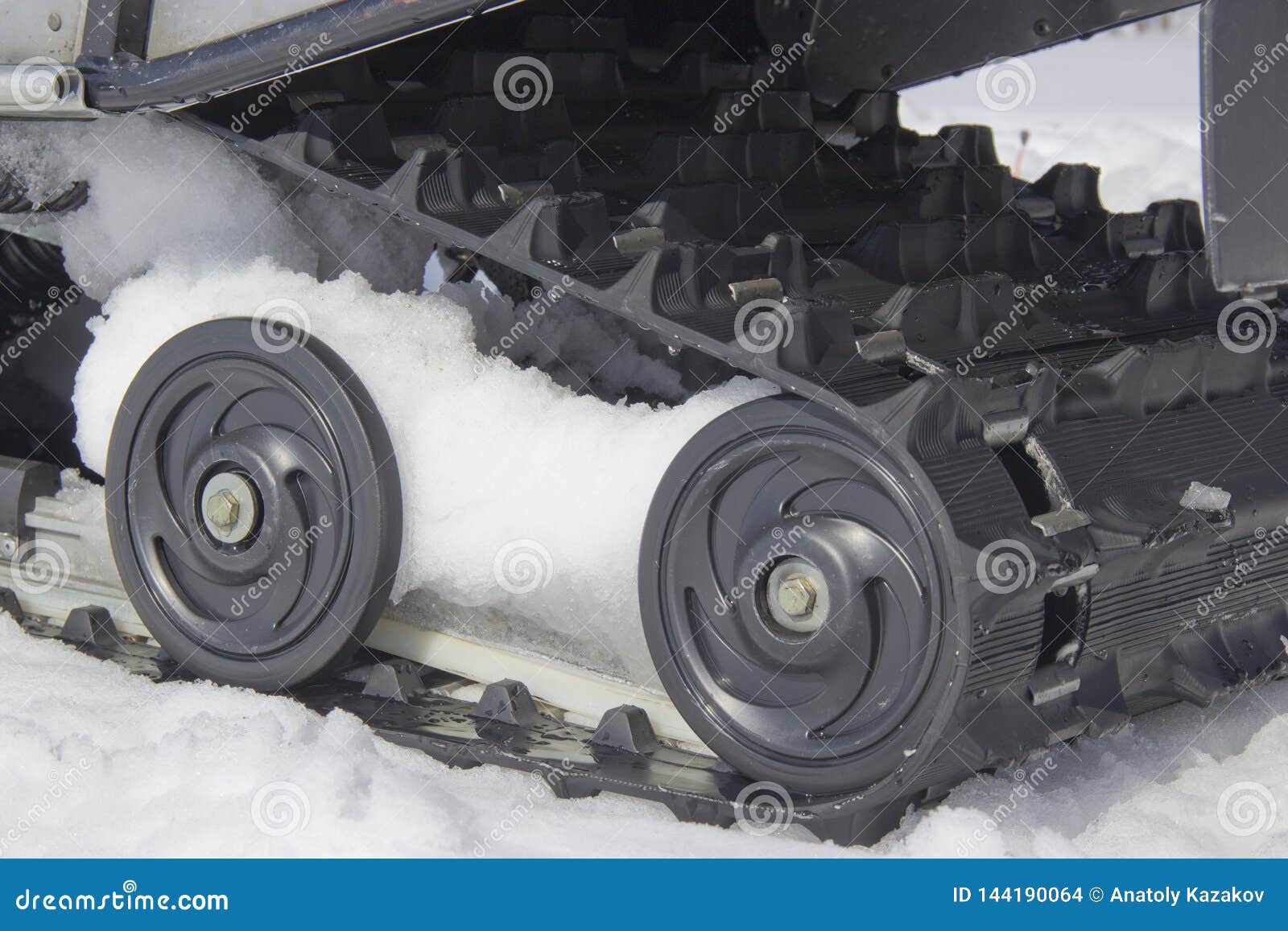 Rollers of the snowmobile stock photo. Image of band - 144190064