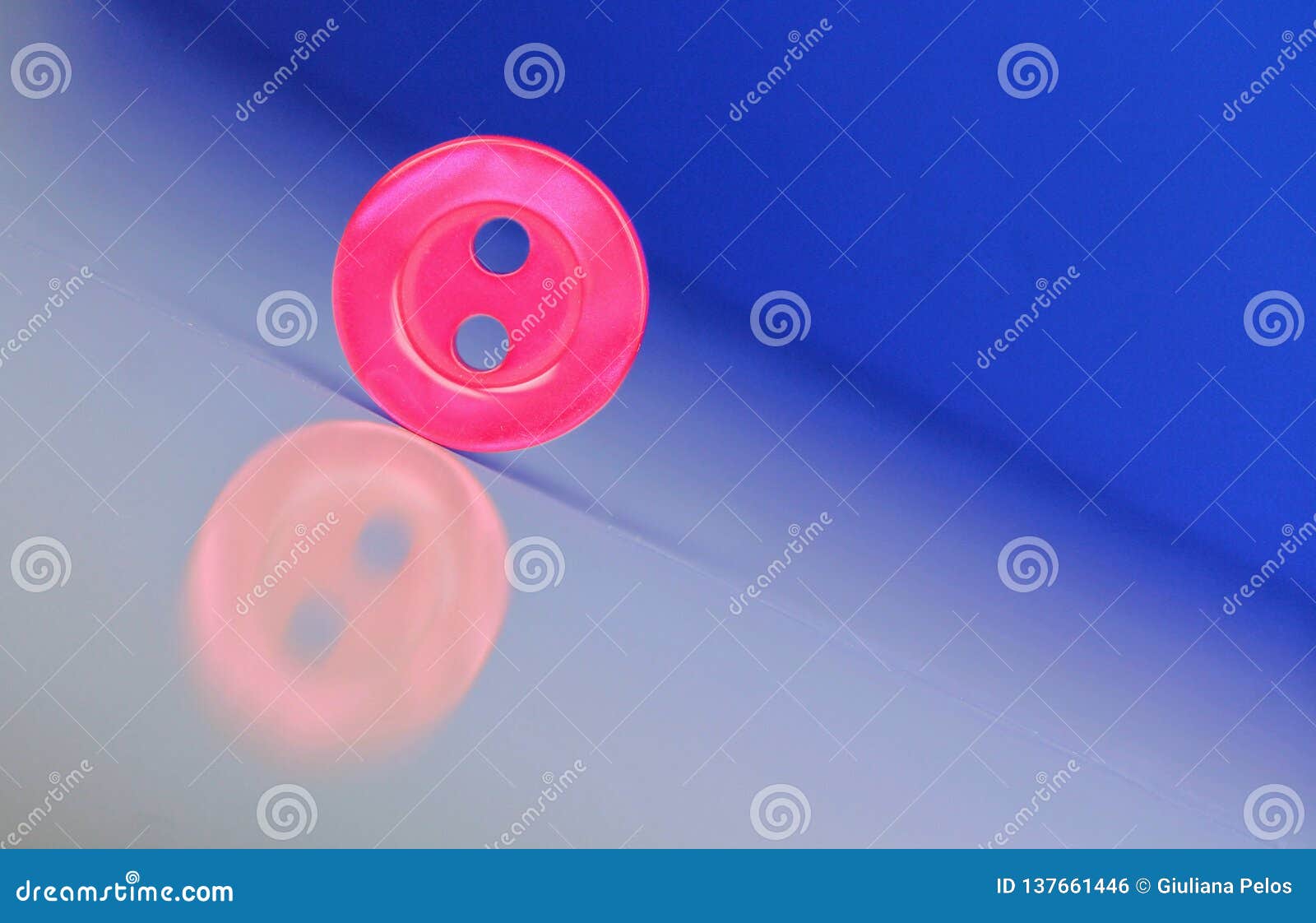Optical Illusions - Rolling on Blue - Botton on a Blue Background ...