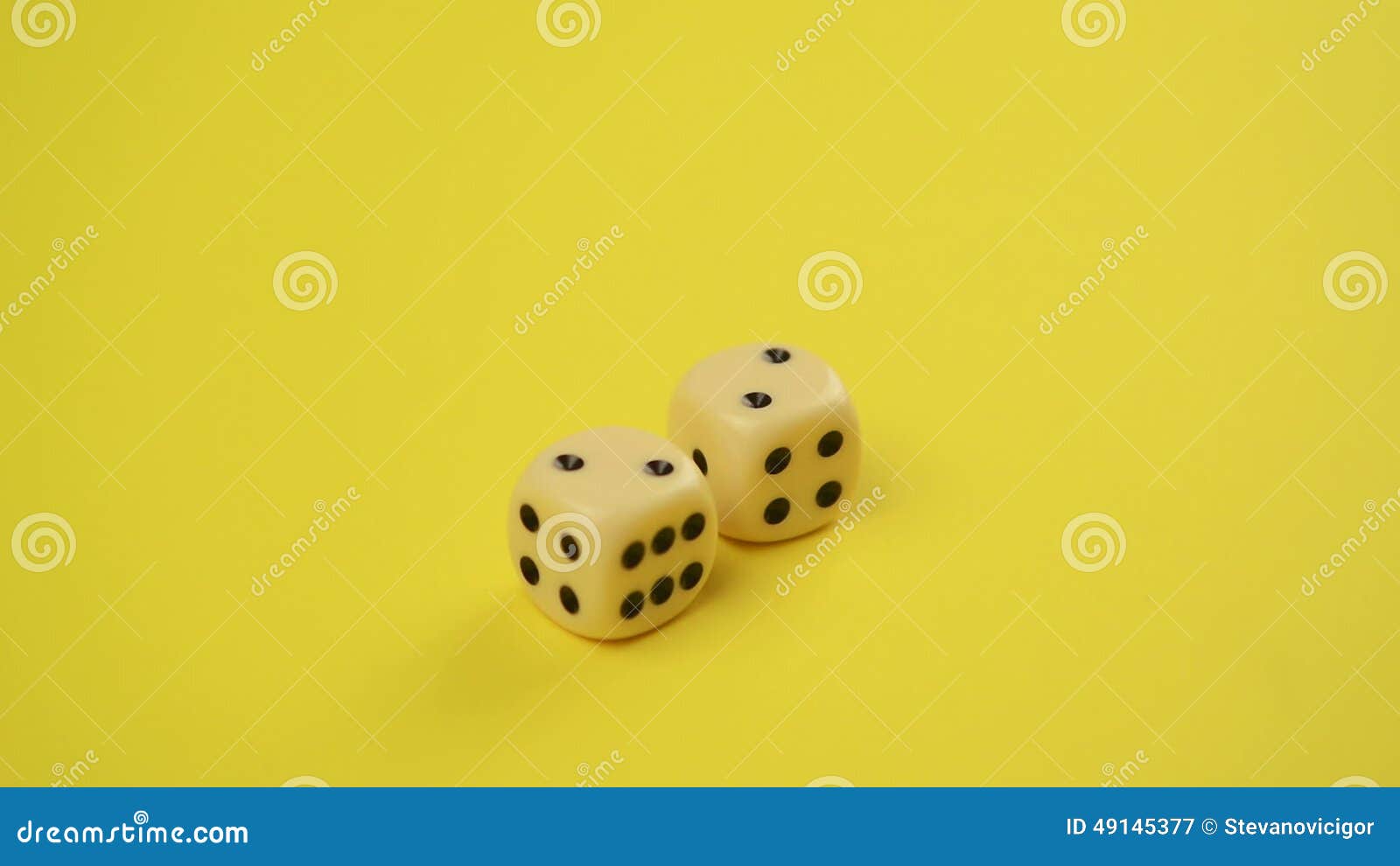 Rolling Dice on Yellow Background As Gambling and Probability Concept ...