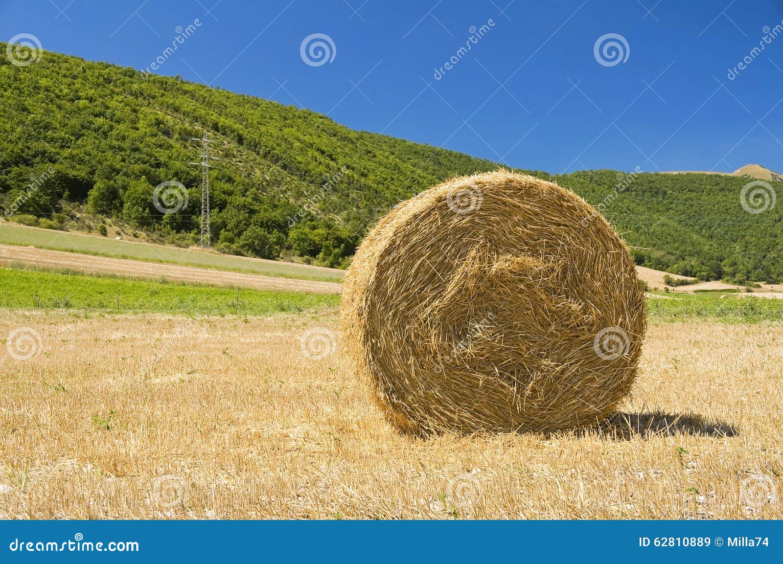 Rolling haystacks. stock image. Image of factory, blue - 62810889