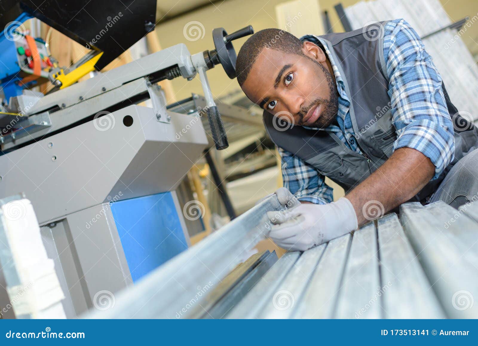 He rolling machine setter stock image. Image of gloves - 173513141