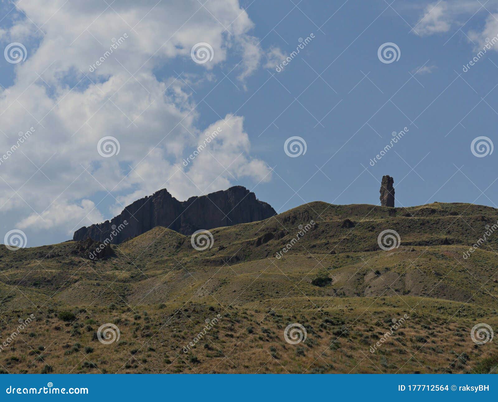 Rolling Mountains with Rock Formations in Wyoming Stock Photo - Image ...