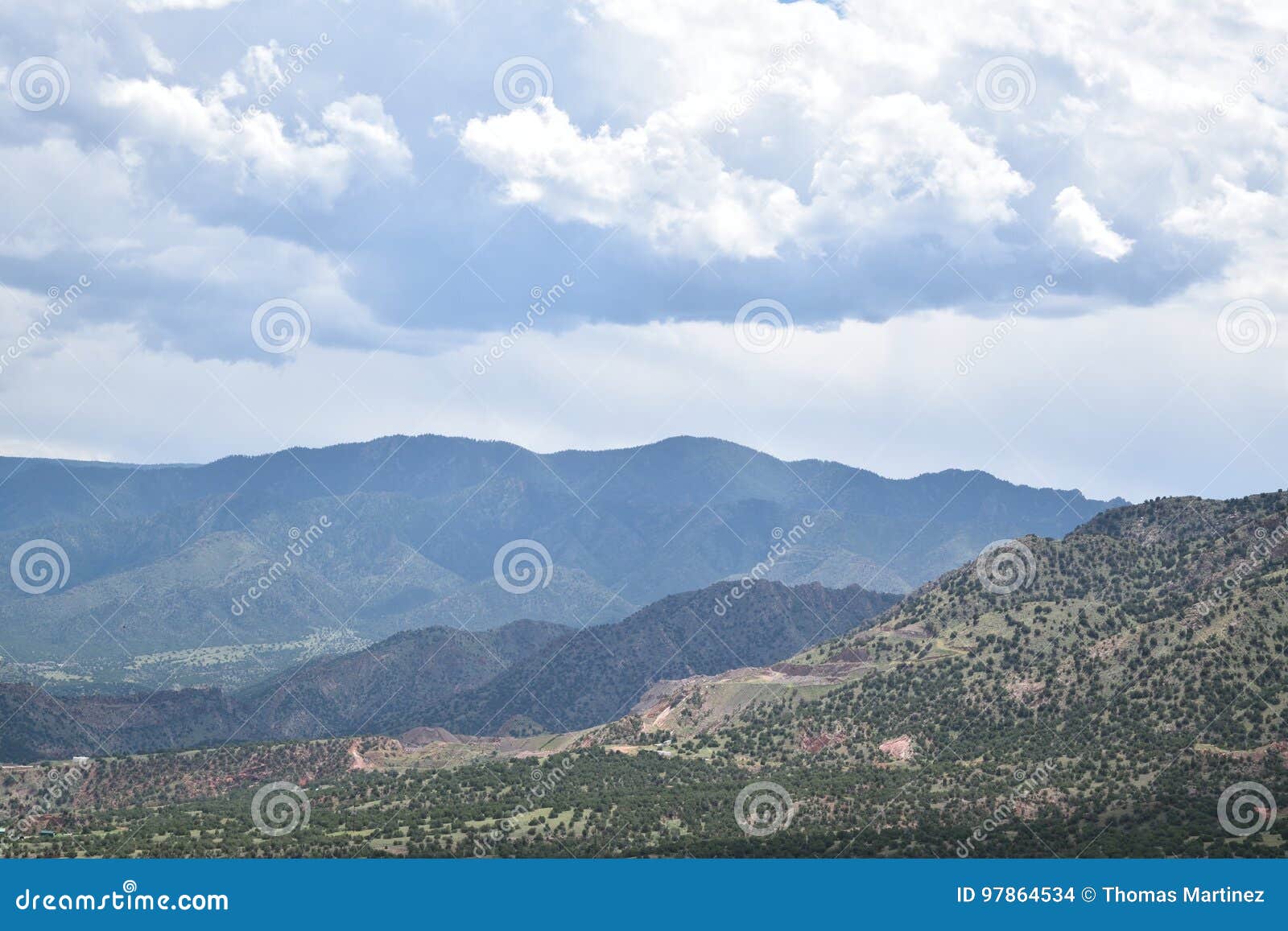 Rolling Mountains stock photo. Image of cloudy, green - 97864534