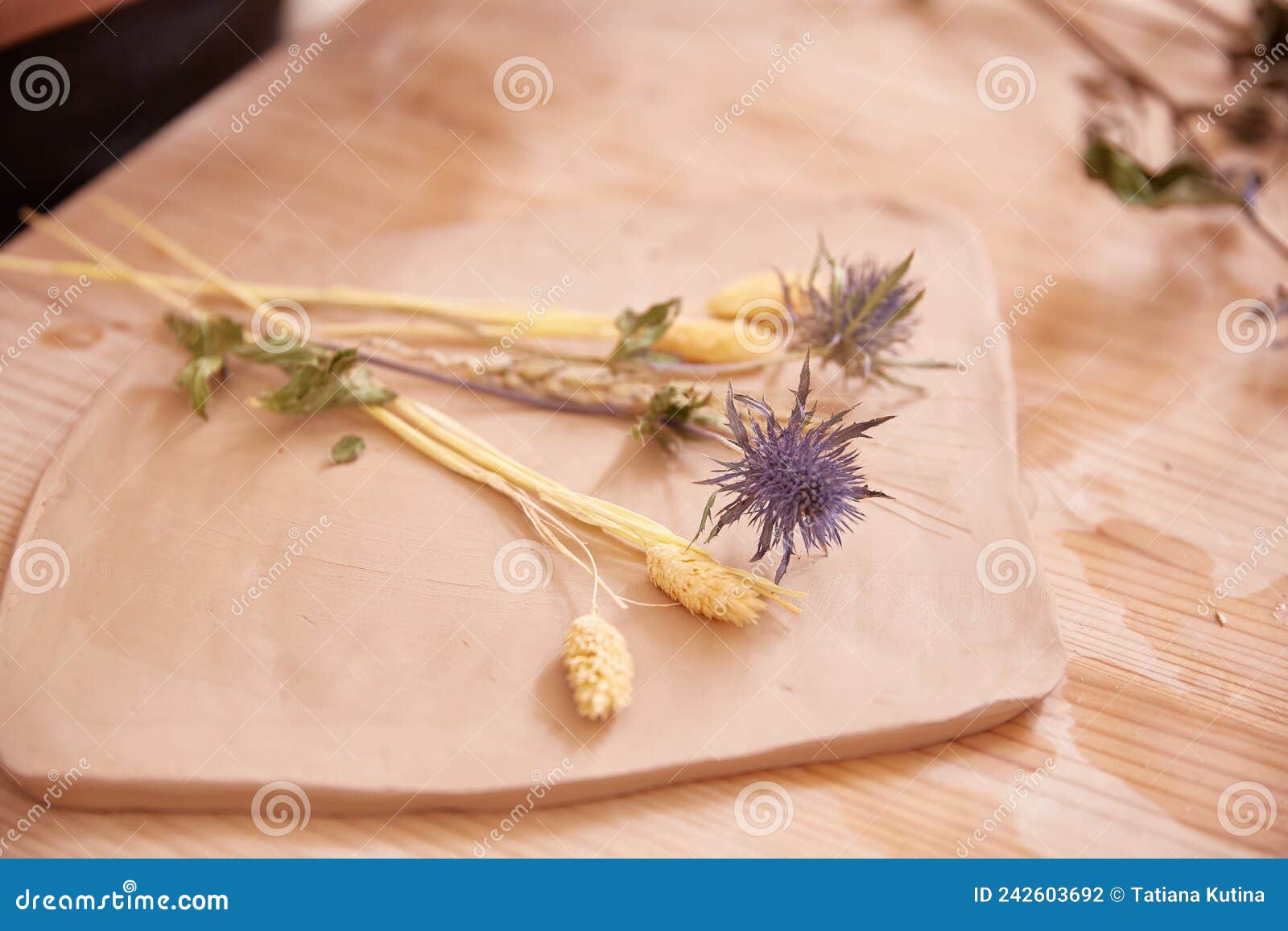 Rolling Out the Clay Mass for Sculpting a Wall Panel. Stock Photo ...