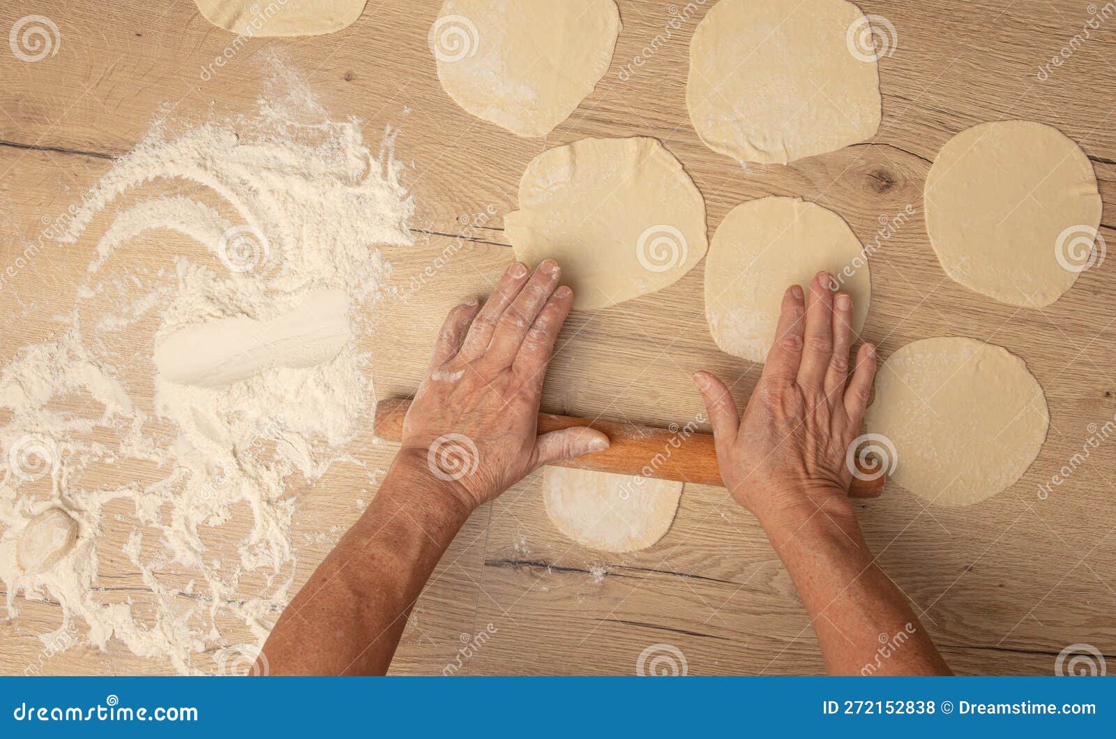 Rolling Out the Dough with Your Hands. Stock Photo - Image of cooking ...