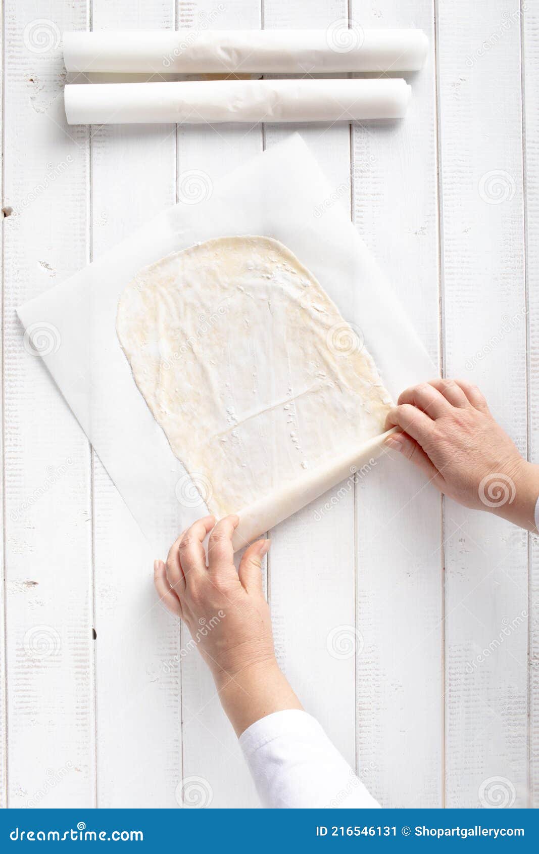 Rolling Phyllo Dough in a Sheet of Kitchen Paper Stock Image - Image of ...