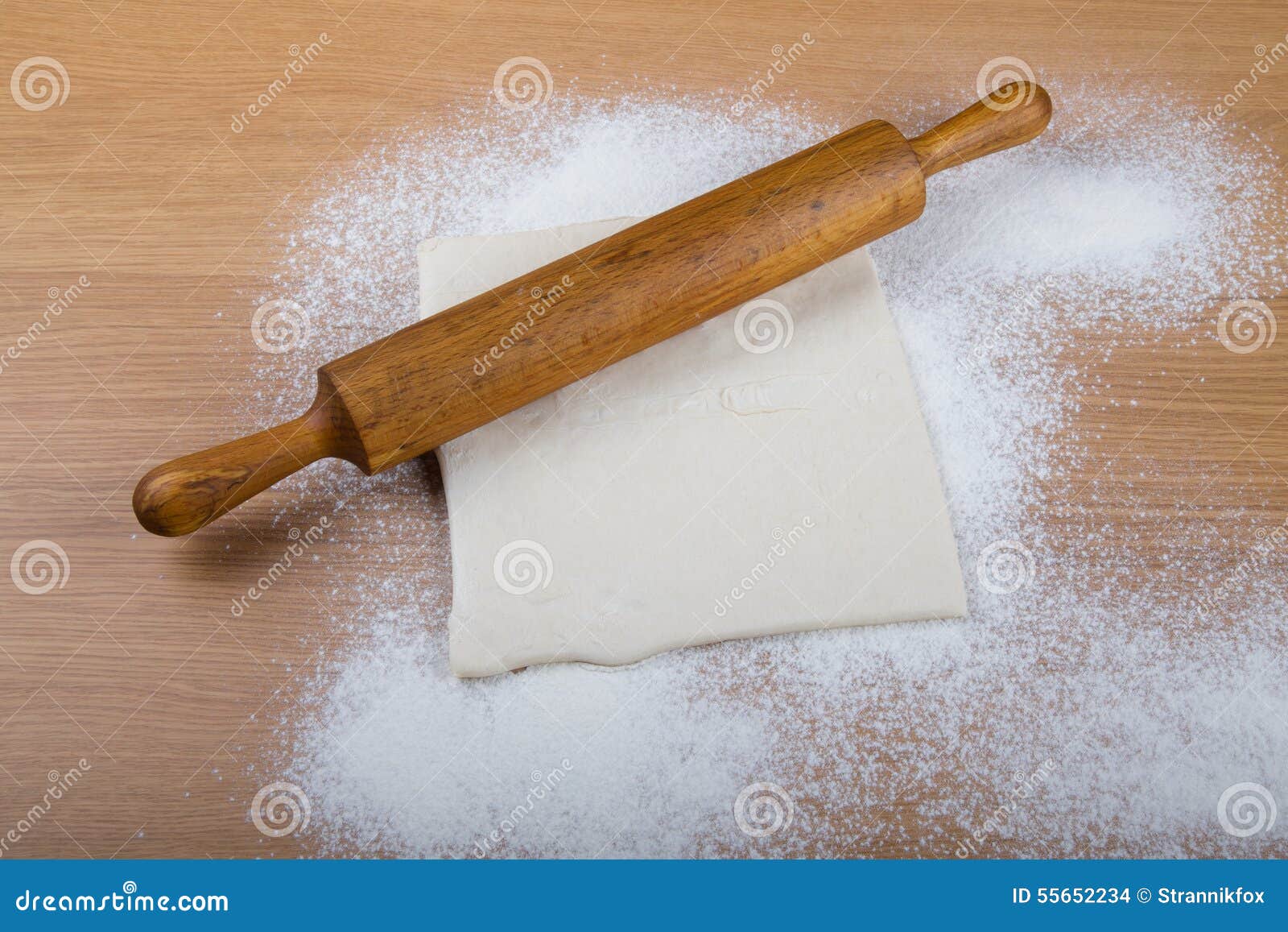 Rolling Pin, Dough and Baking Form on a Light Wooden Table with Stock ...