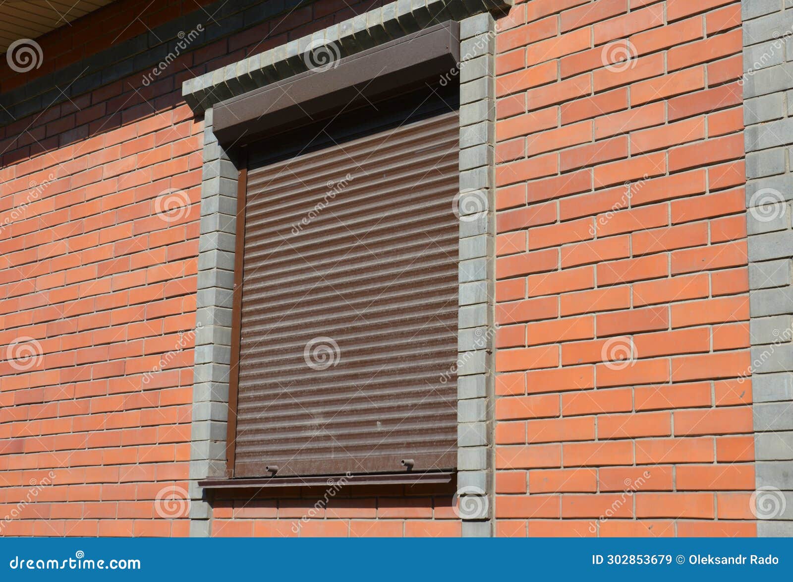 Rolling Shutters Brick House Windows Protection. Brick House with Metal ...