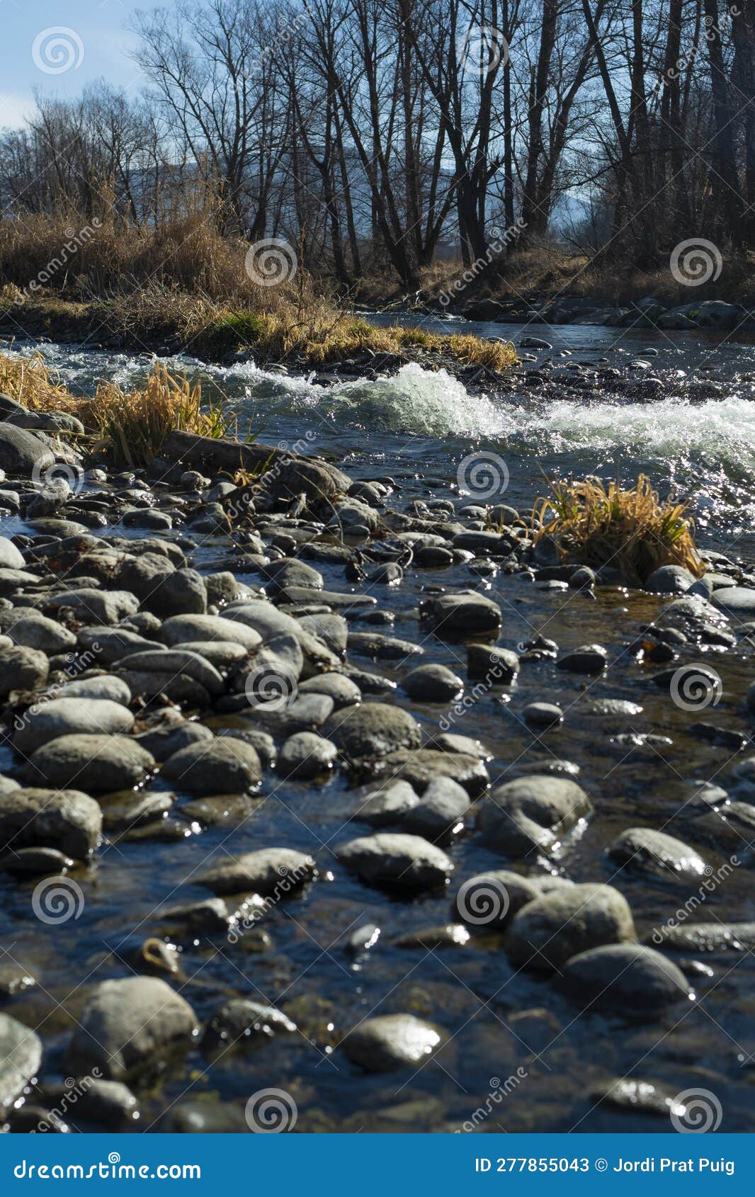 Rolling Stones on a River Water Edge Landscape Stock Image - Image of ...