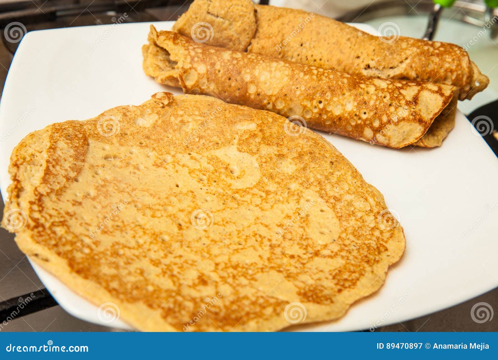 Rolling up quinoa crepes stock image. Image of vegetable - 89470897