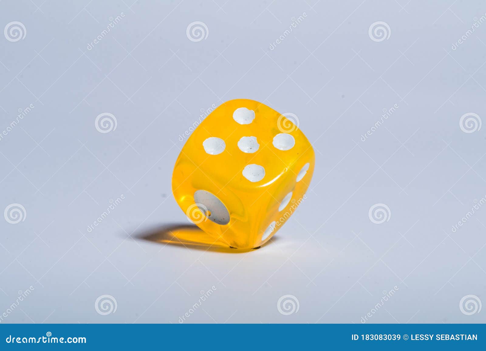 Rolling yellow dice stock image. Image of line, floor - 183083039