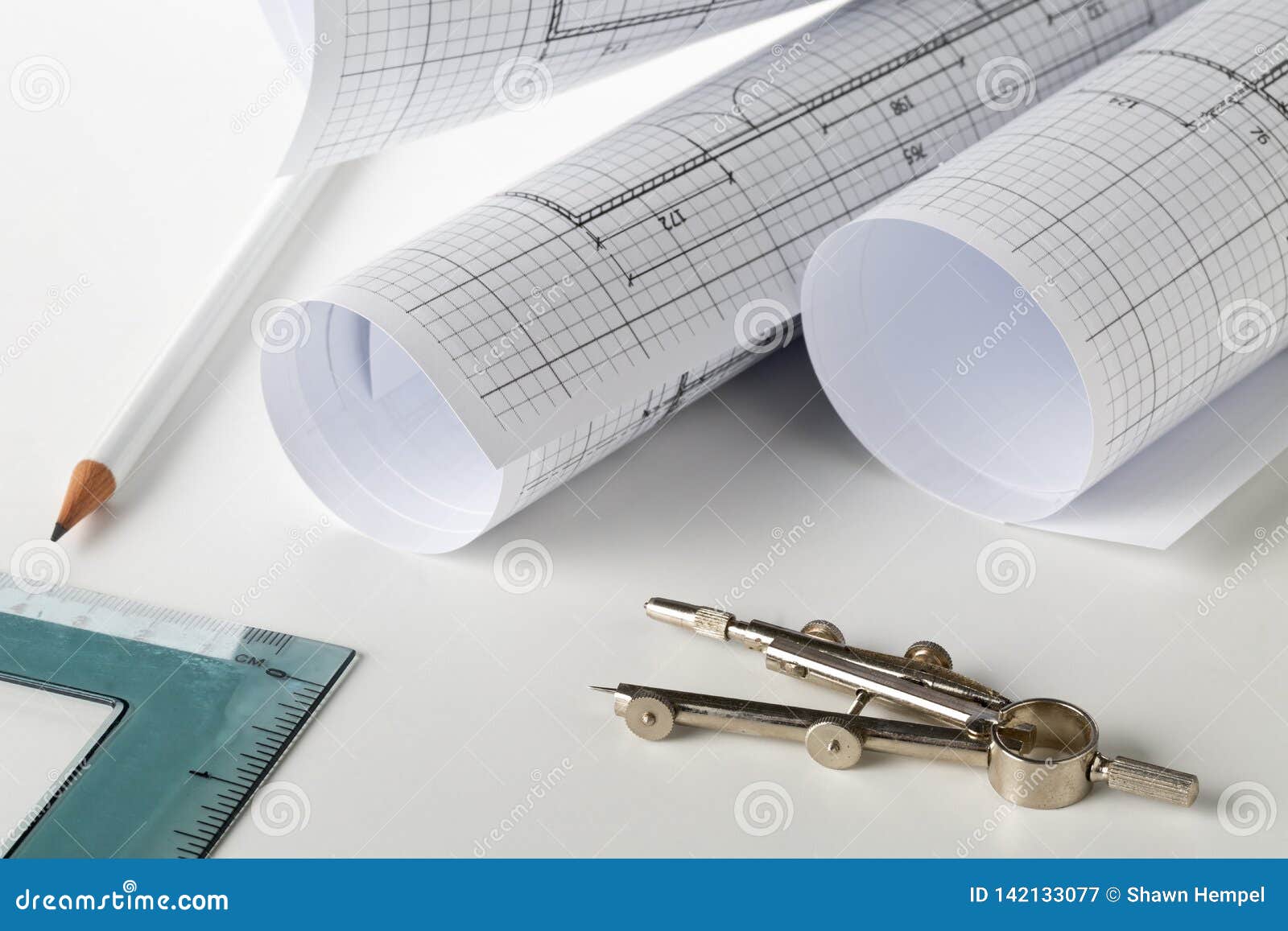 Rolls of Architectural Blueprint House Building Plans on White Table ...