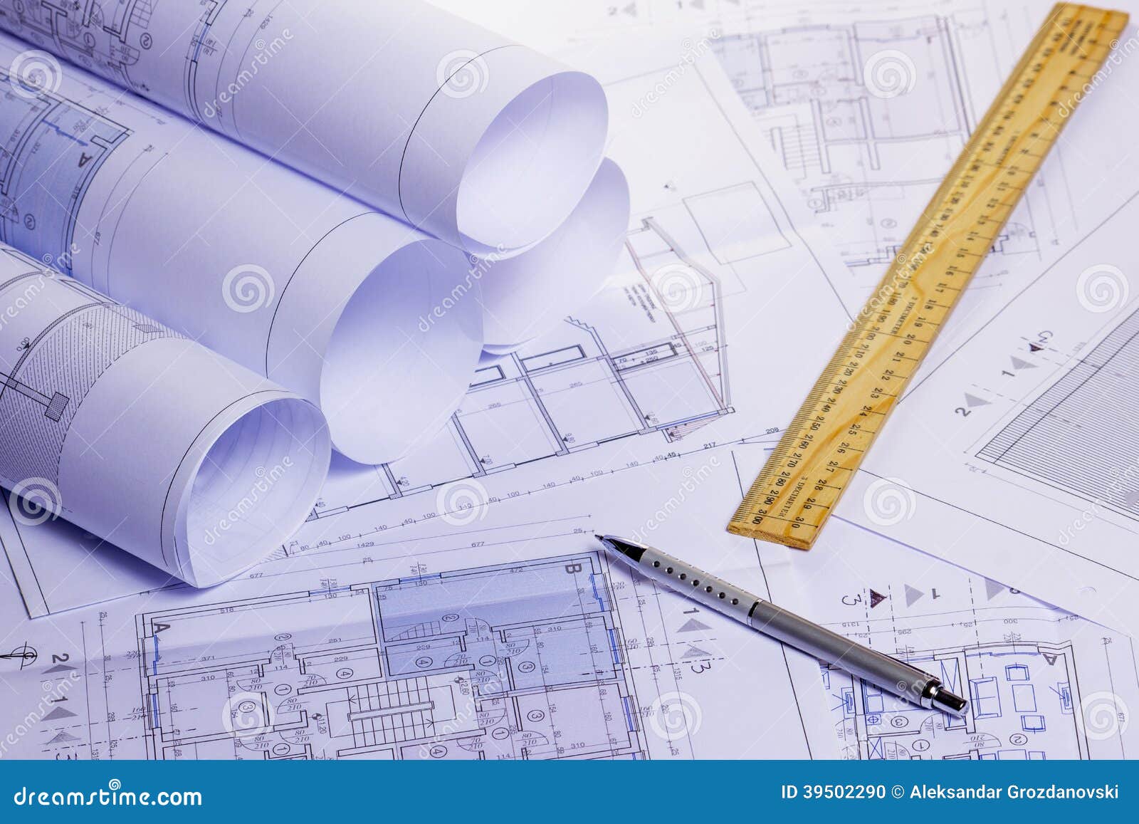 Rolls of Architectural House Plans Stock Photo - Image of drawings ...