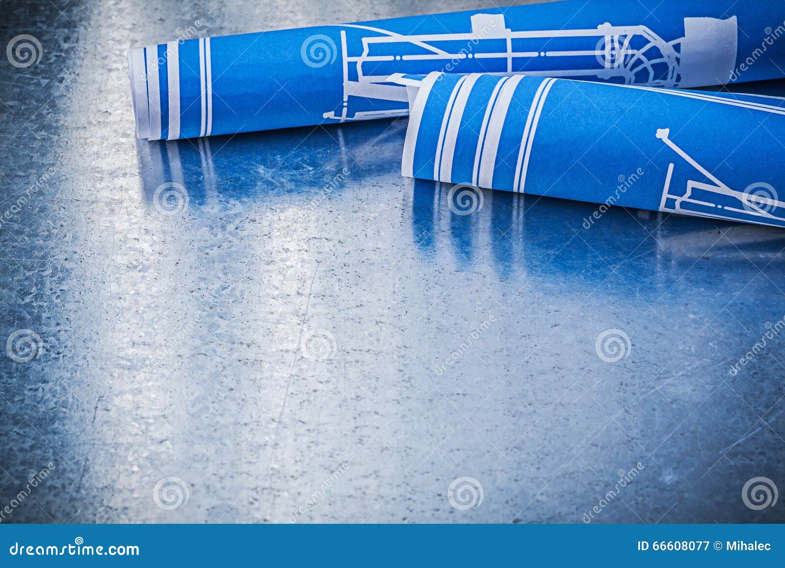 Rolls of Blue Construction Drawings on Metallic Background Build Stock ...