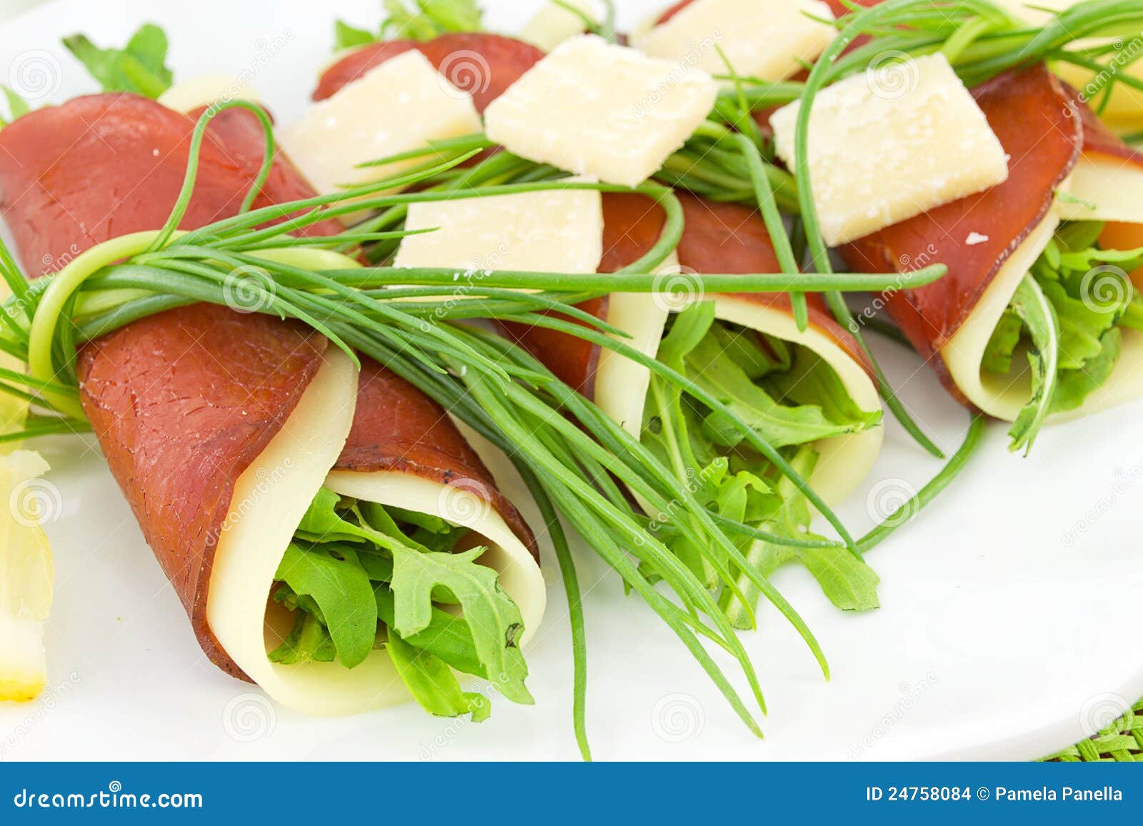 Rolls of Bresaola, Arugula and Parmesan Stock Photo - Image of cooking ...