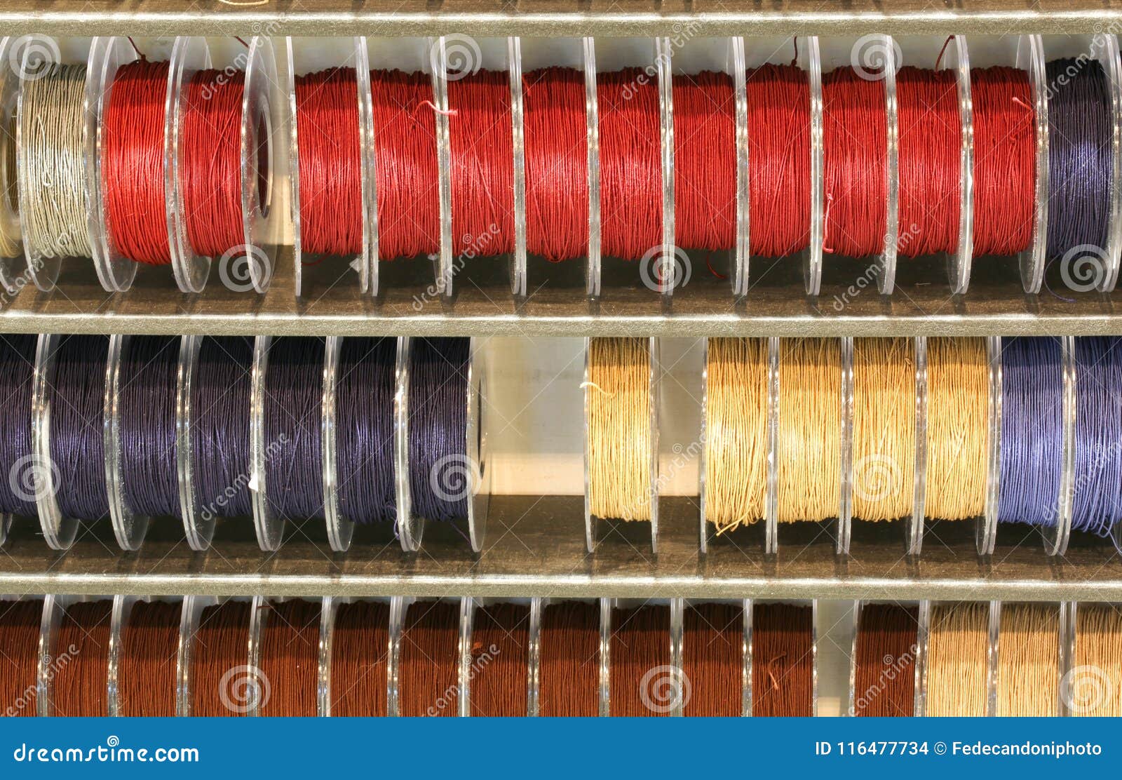 Rolls of Colored Threads on Display in a Tailor Shop Stock Photo ...