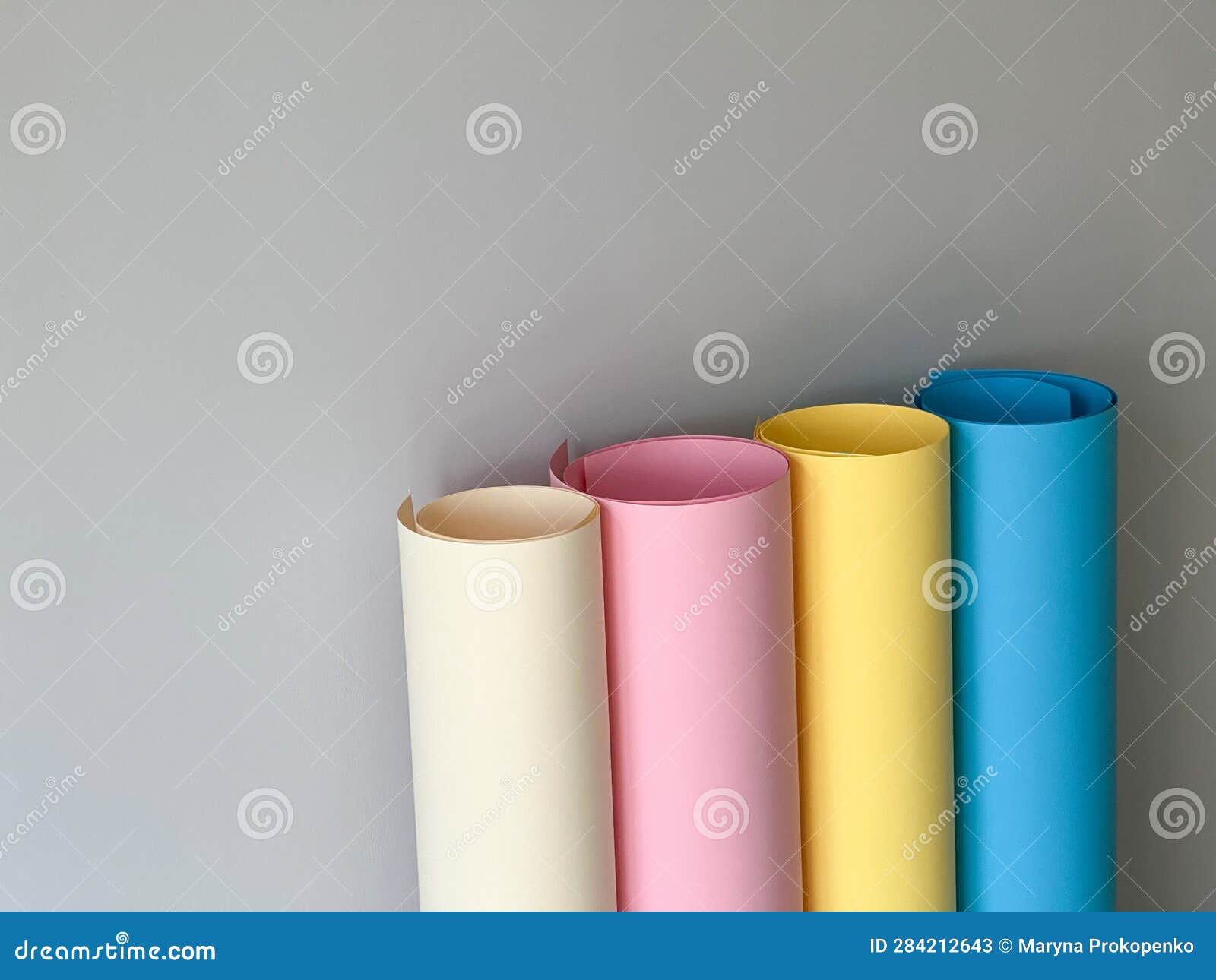 Rolls of Colourful Paper on a Simple Background Stock Image - Image of ...