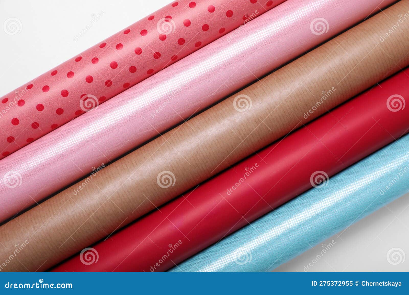 Rolls of Different Bright Wrapping Paper on White Background, Top View ...