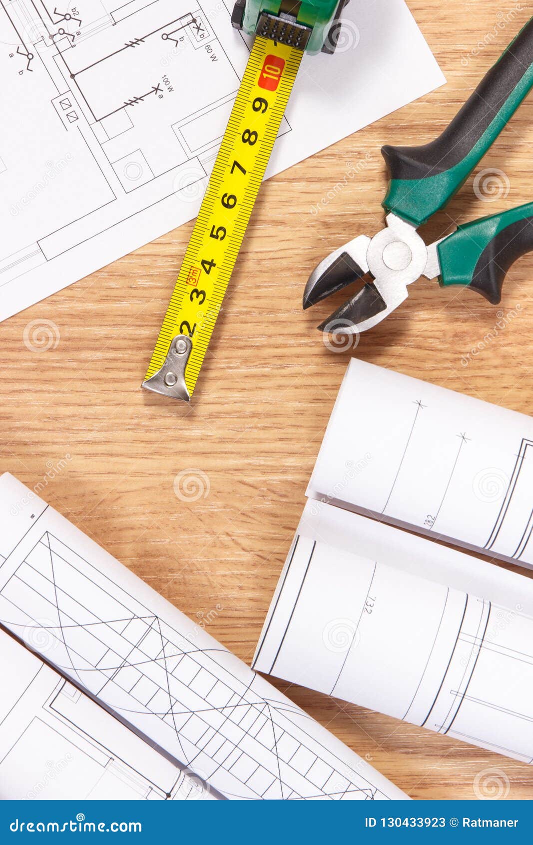 Rolls of Electrical Drawings or Blueprints and Work Tools for Engineer ...
