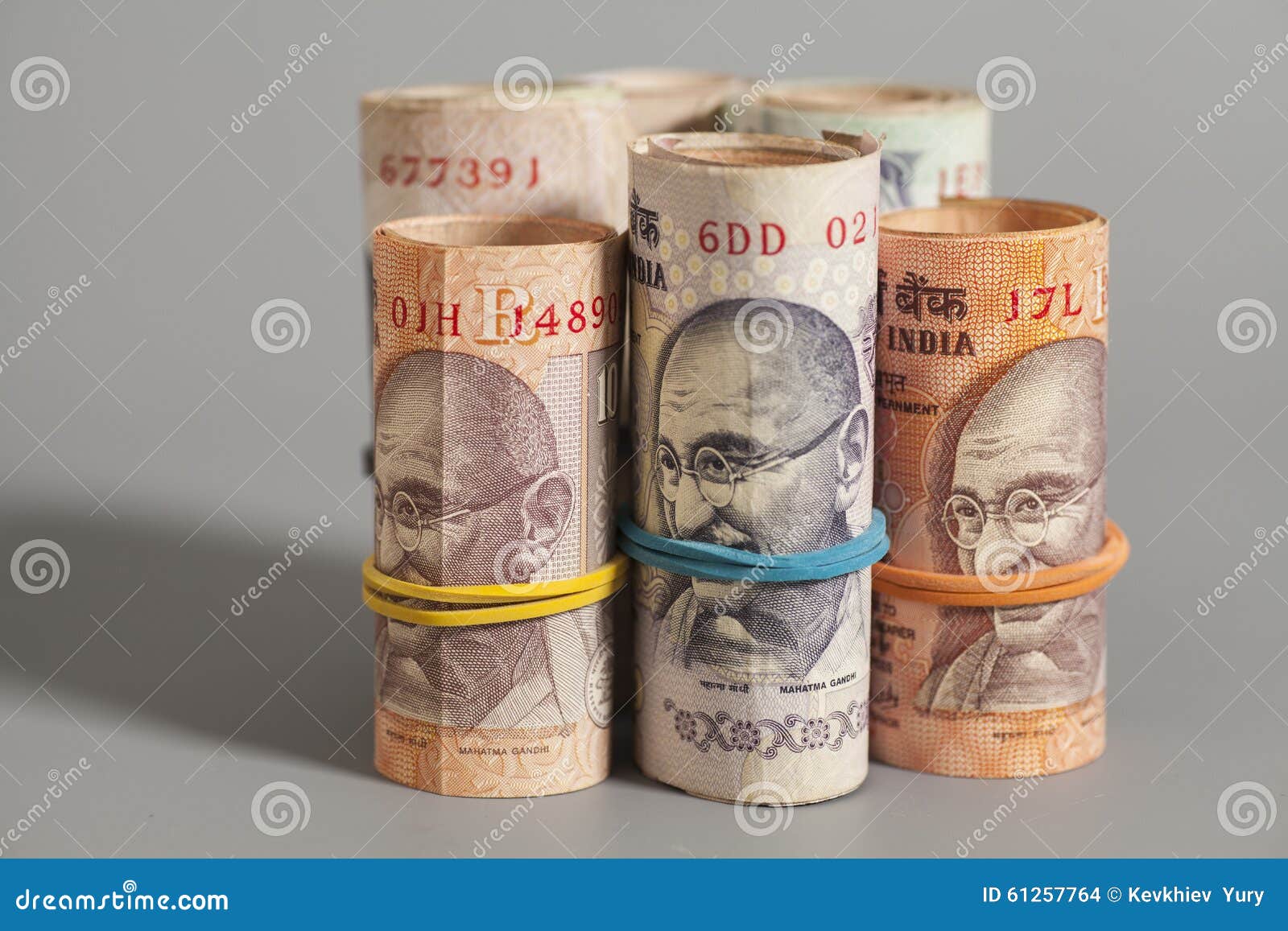 Rolls Of Indian Currency Rupee Notes With Magnifying Glass Royalty-Free ...