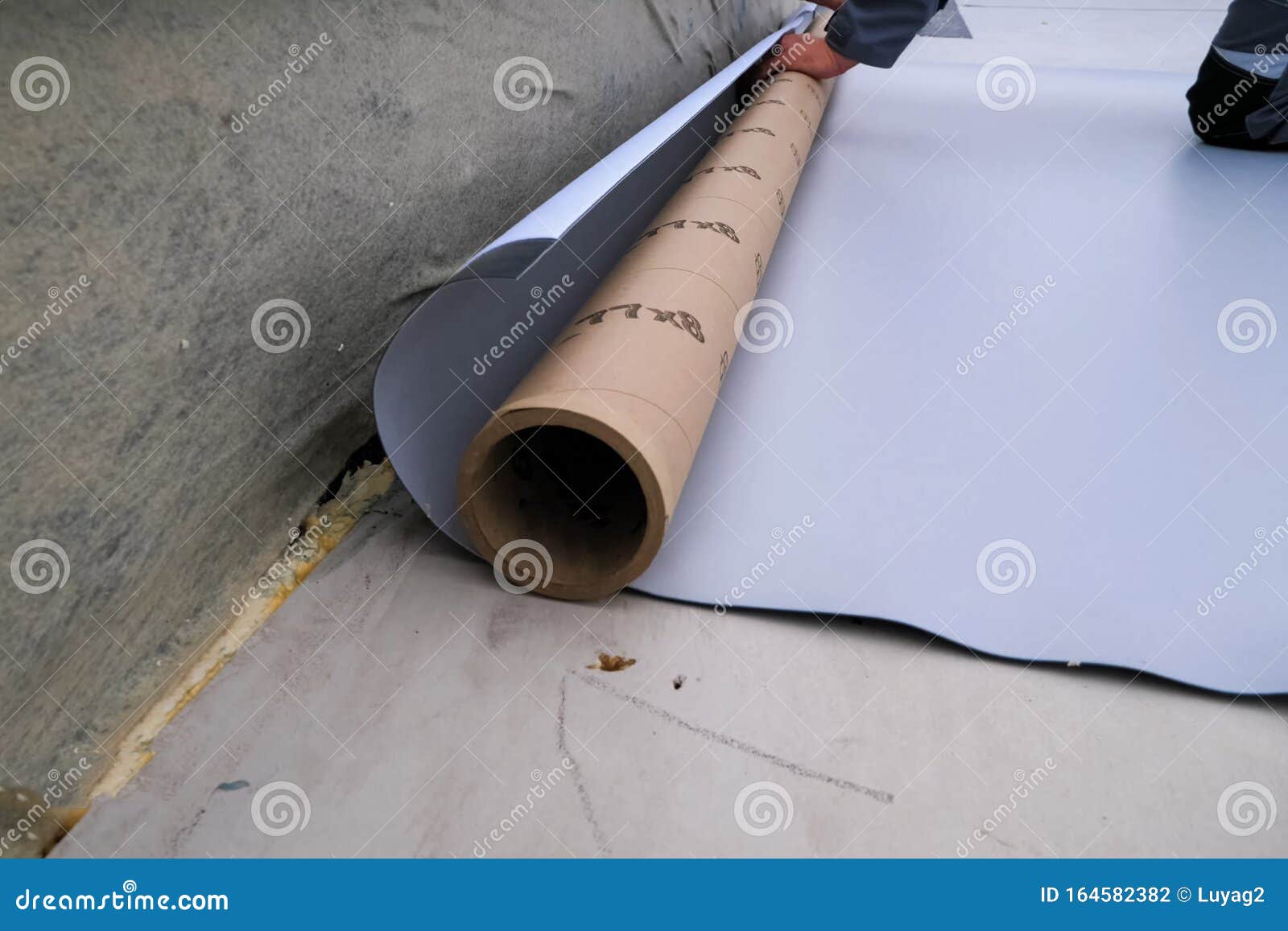 Rolls of Polymer Coating for Roof. Deployment of a Roof Covering Roll ...