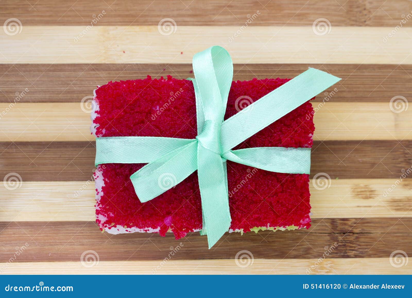 Rolls with a Ribbon on a Cutting Board on a White Background Isolated ...
