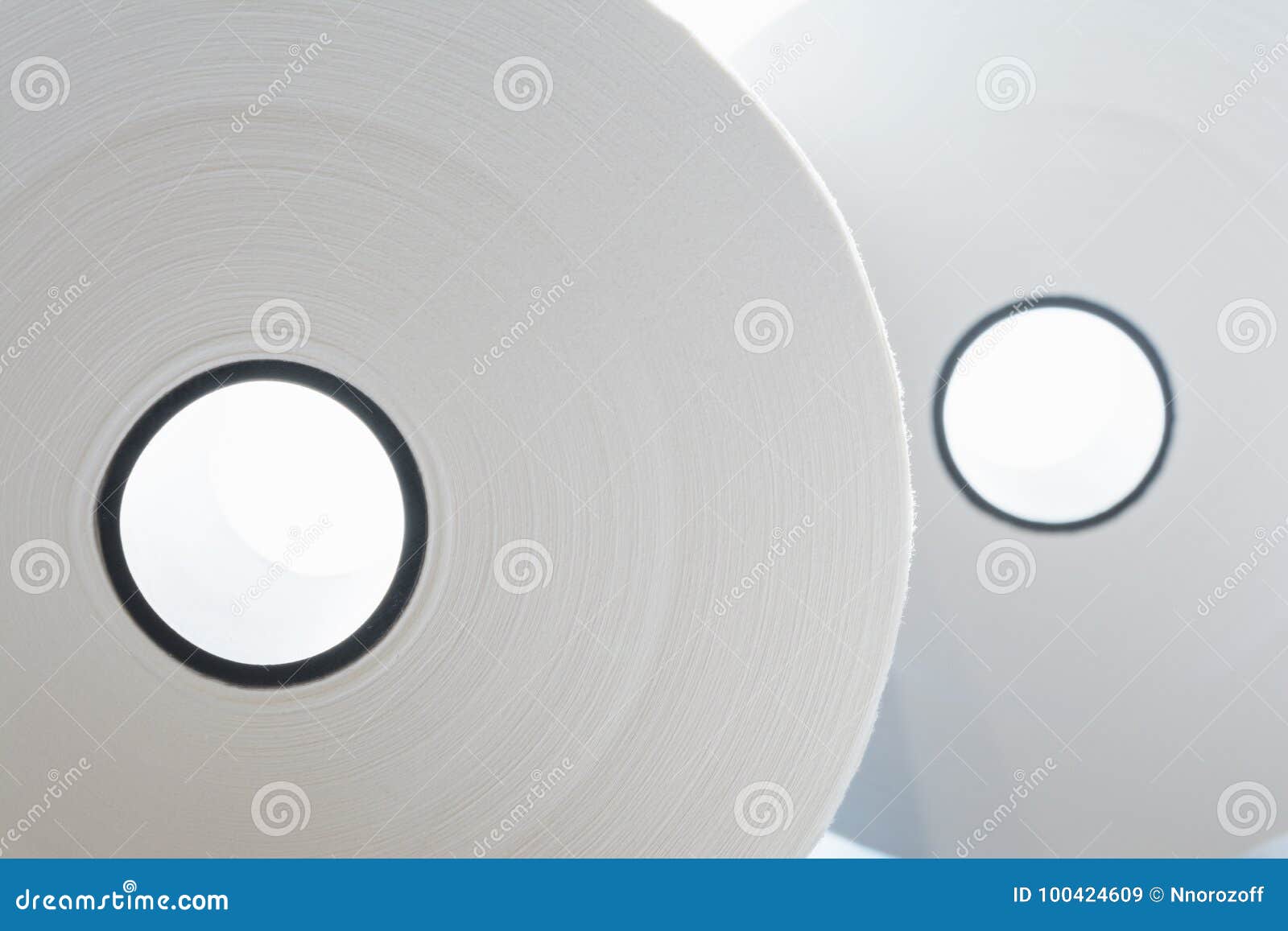 Rolls of White Paper with Black Coils on White Background Stock Image ...