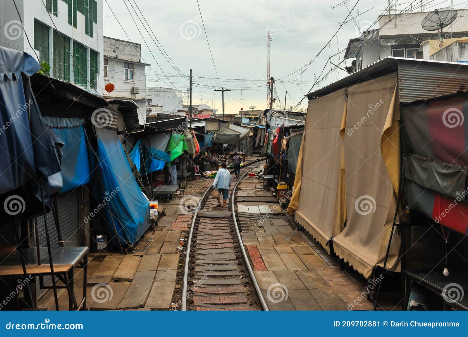 Rom Hoop Market. Thai Railway With A Local Train Run Through Mae Klong ...