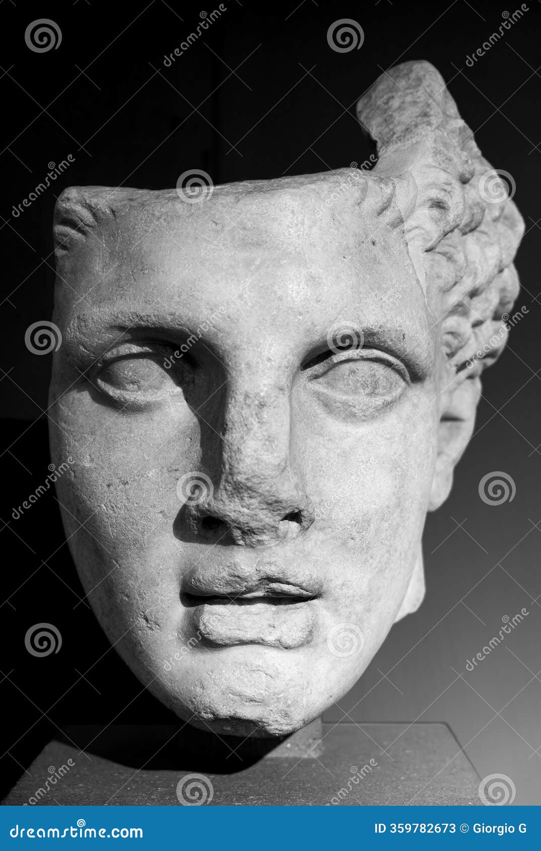 Black and White Photo Showing in Close-up the Broken Head of Ancient ...