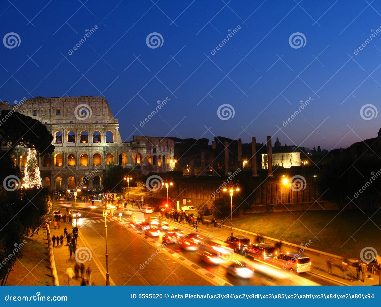 Roman Colosseum at night stock photo. Image of detail - 6595620