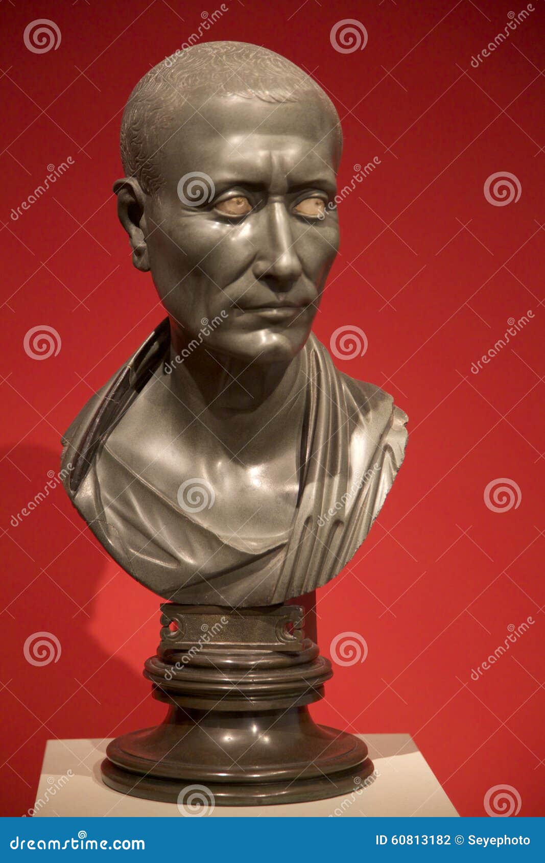 Roman Sculpture Of Woman High Above With Blurred Trees In The ...