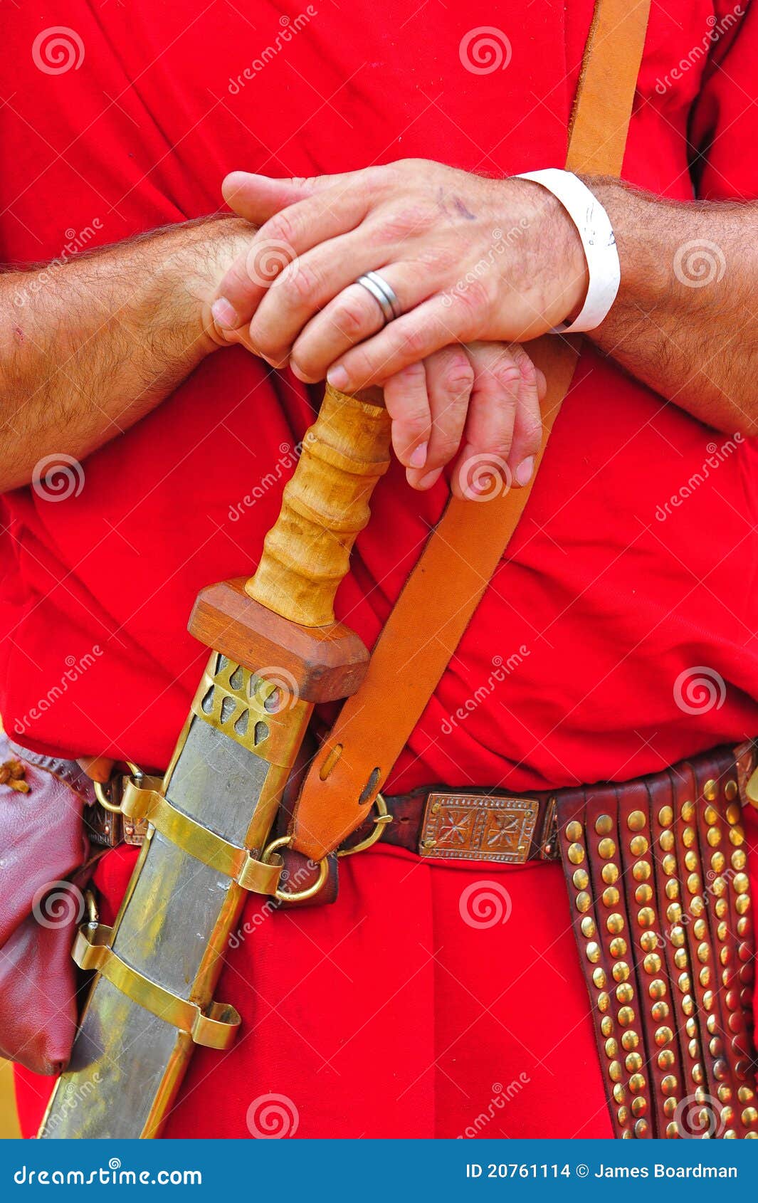 A Roman Soldier Rests His Hands on His Sword Stock Photo - Image of ...