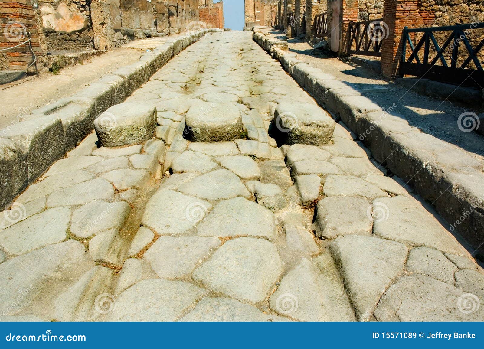 Old Roman Street Leading To Gateway At Ancient Roman Ruins Of Leptis ...