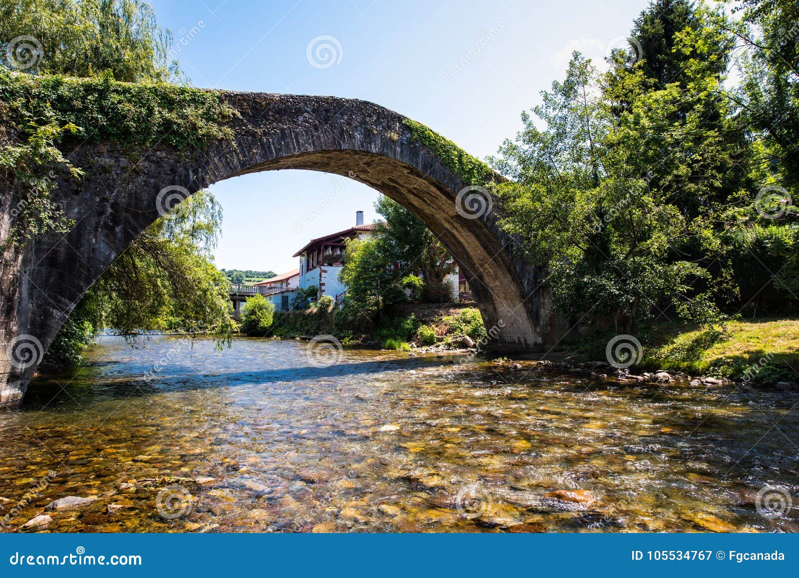 Ancient Bridge Over the River Nive at St Etienne De Baïgorry, Stock ...