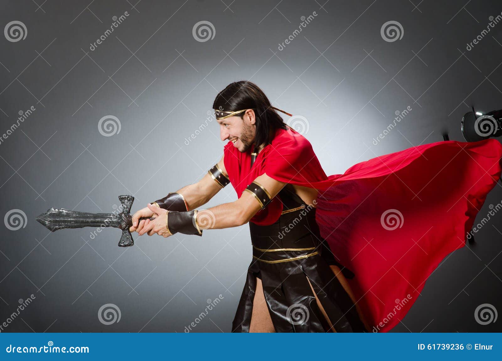The Roman Warrior with Sword Against Background Stock Photo - Image of ...