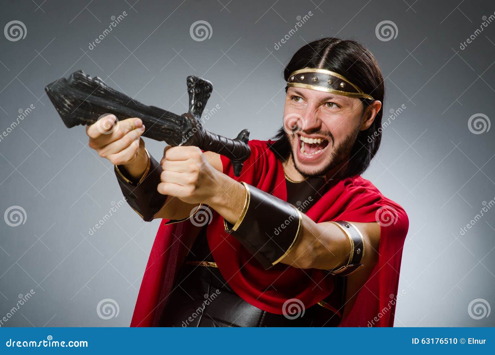 The Roman Warrior with Sword Against Background Stock Photo - Image of ...