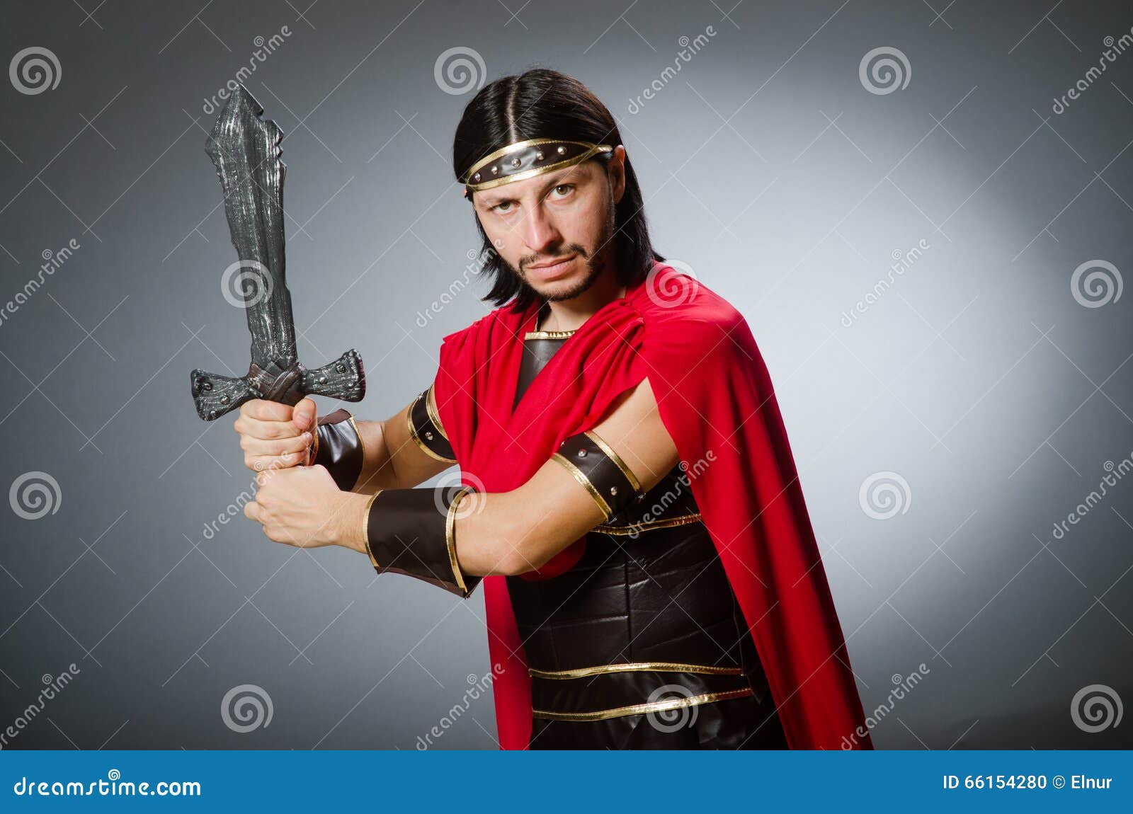 The Roman Warrior with Sword Against Background Stock Photo - Image of ...