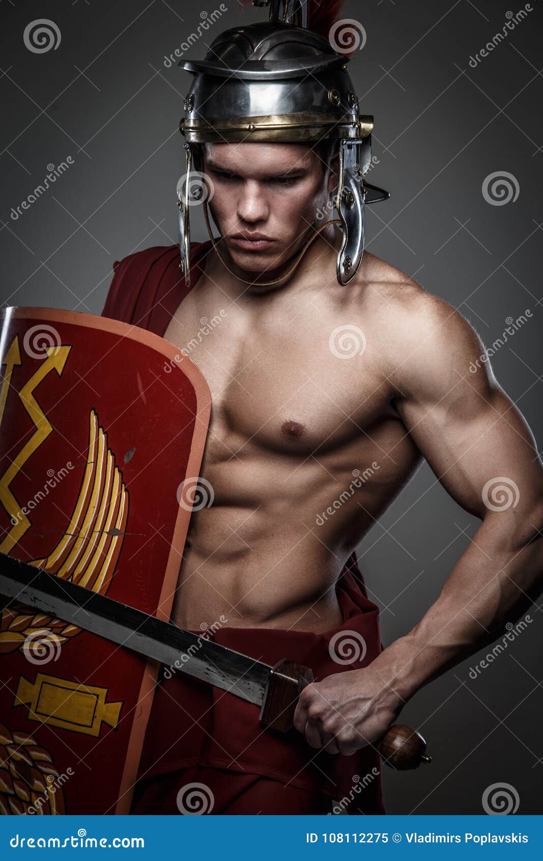 The Roman Warrior With Sword Against Background Stock Photo ...