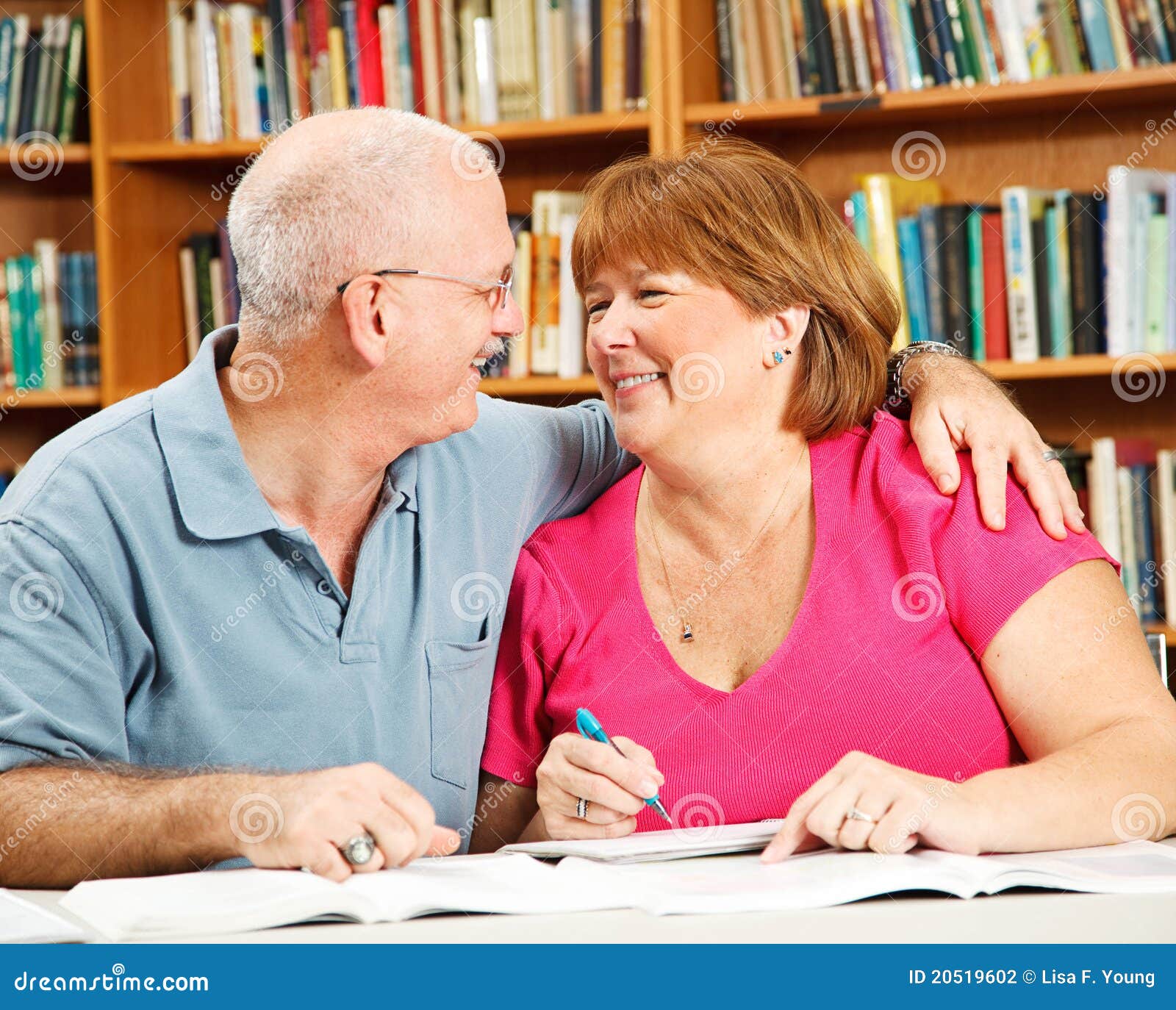 Romance at the Library stock photo. Image of friendship - 20519602