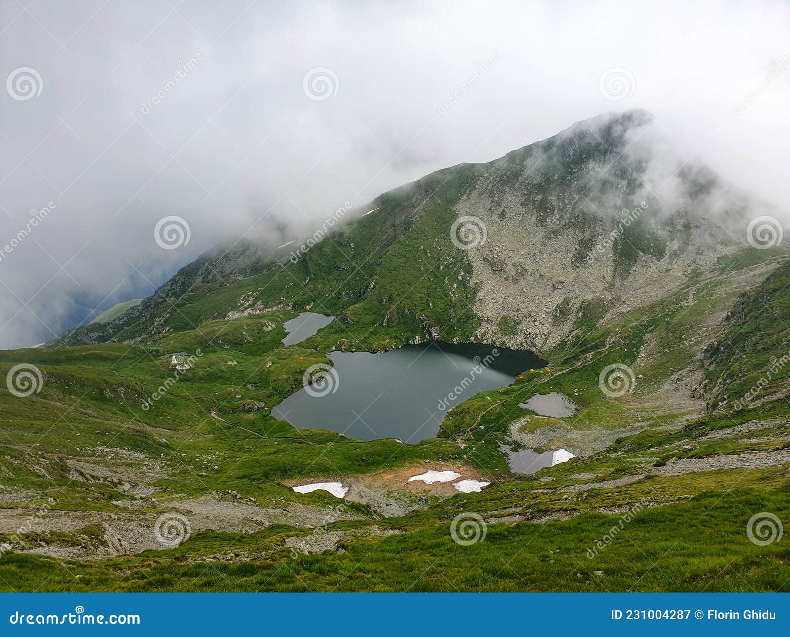 Romania, Fagaras Mountains, Capra Lake Stock Image - Image of mountains ...