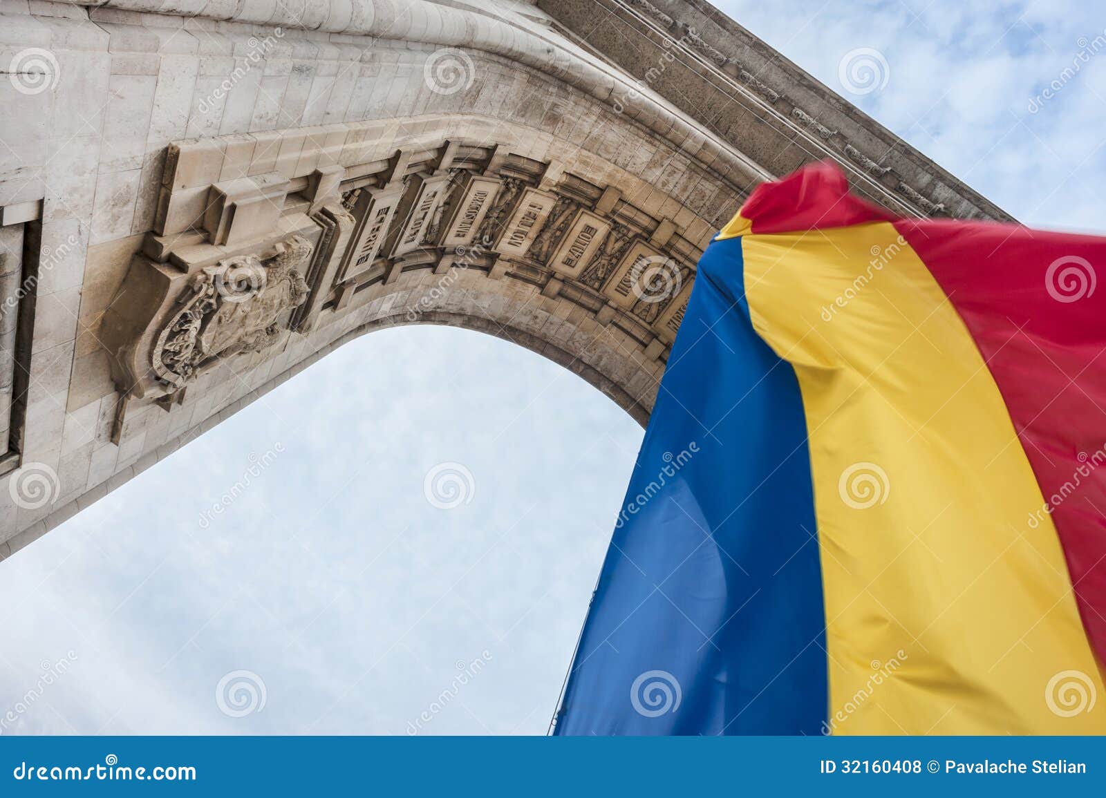 Romanian Flag Hanging on Triumphal Arch in Bucharest Stock Photo ...
