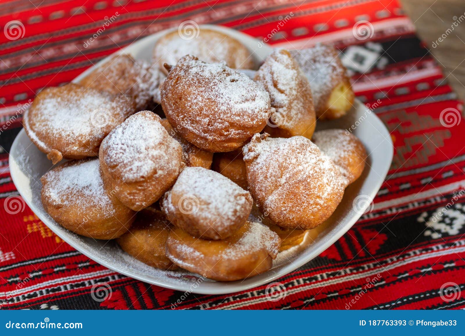 Romanian Mini Doughnuts on a Plate on Red Traditional Cloth Stock Image ...